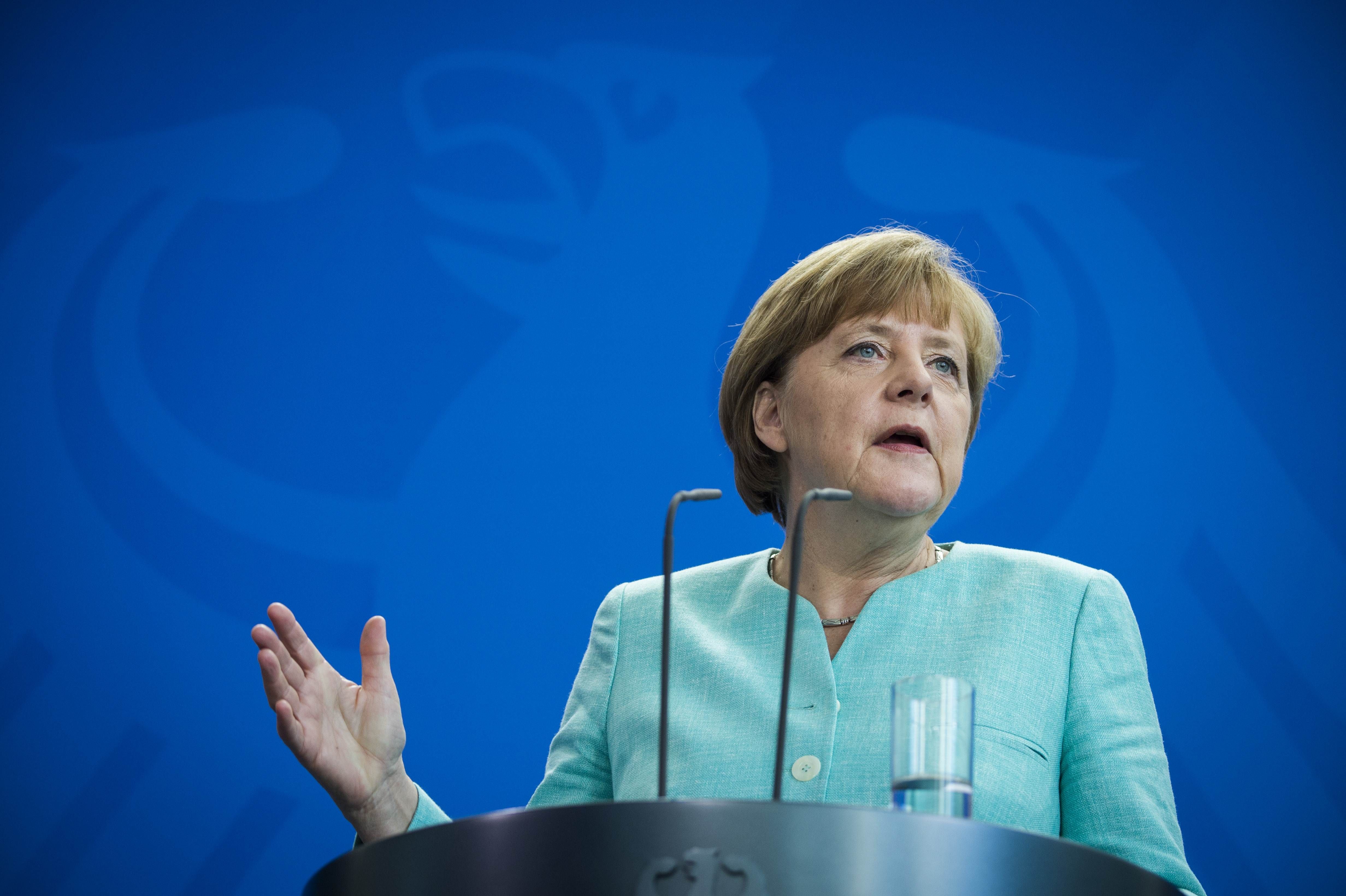 Activists urge people to sign letter to German Chancellor A. Merkel ...