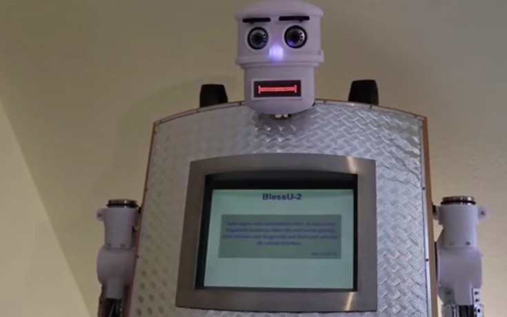 Meet the robot "priest" that blesses the faithful in Germany (video ...