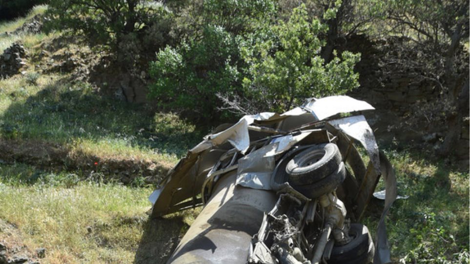 Shocking photos of mangled garbage truck that plunged off cliff in ...
