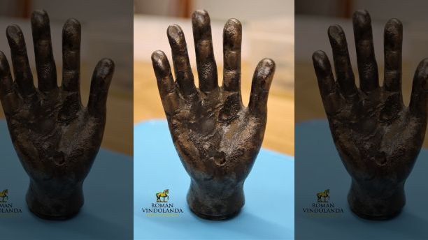 Roman "hand of god" unearthed by archaeologists near Hadrian's Wall ...