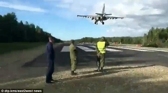Warplanes thunder over stunned motorists after Russian Air Force turns ...