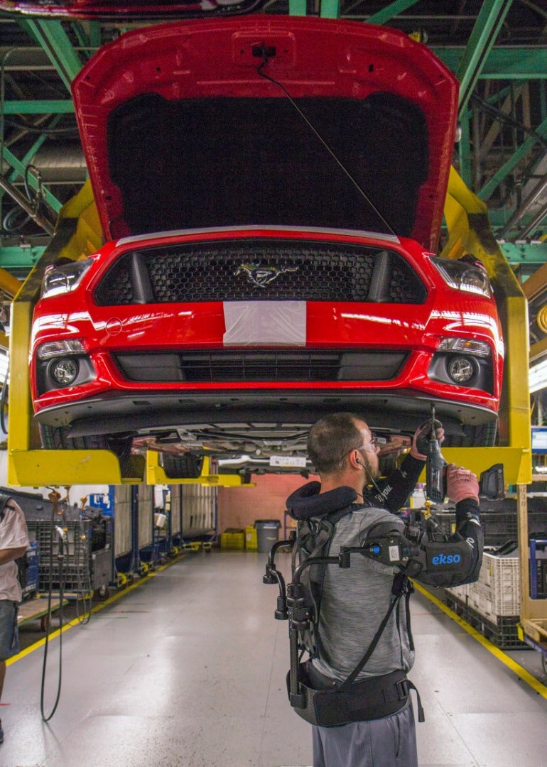 Ford makes EksoVest exoskeletons available to employees worldwide after ...