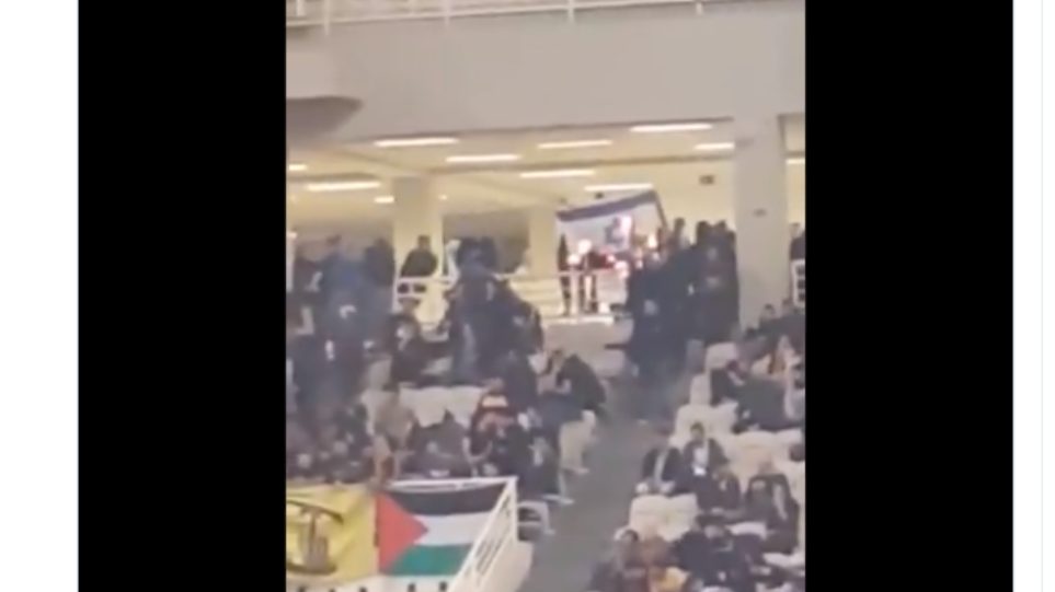 AEK fan burns Israeli flag during basketball match in Athens (video ...