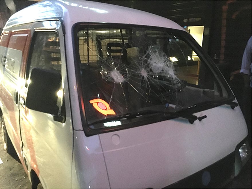 Anti-establishment protesters smash shop windows in Athens ...