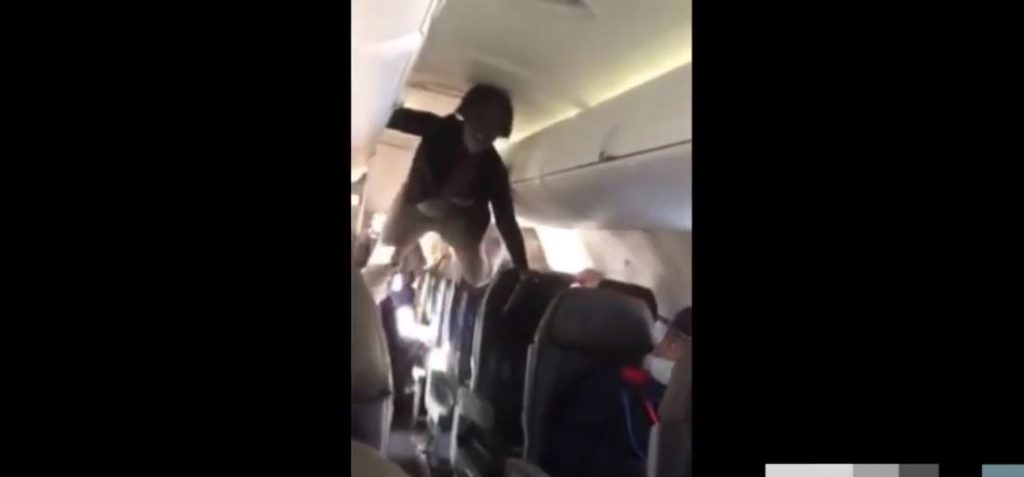 Scary woman in 'demonic possessed' seizure on airplane (unsettling ...