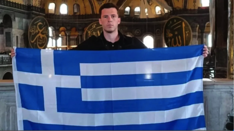 A Greek man opened the Greek flag at Hagia Sophia and wrote "My beloved ...