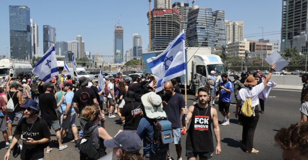 Israeli labor court orders end to general strike - Protesters remain in ...